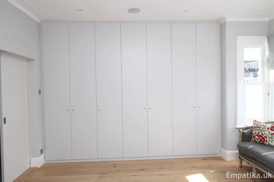 Large pull-down rail wardrobe - Empatika